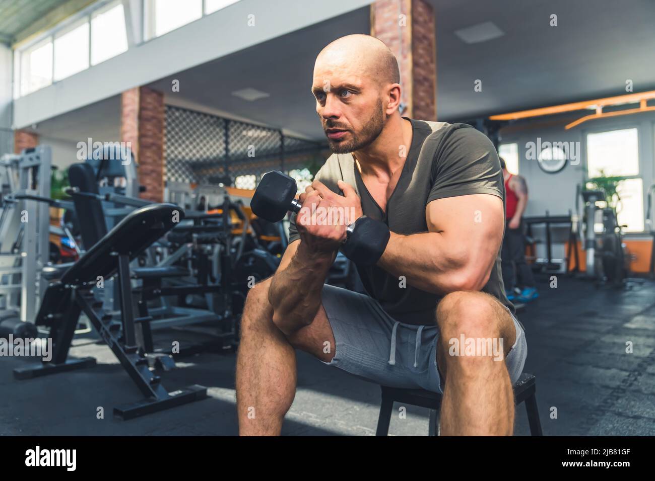 Handsome men exercising in gym hi-res stock photography and images - Alamy