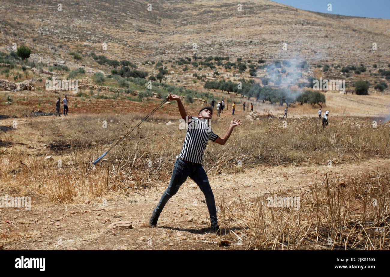 Nablus, Palestine. 03rd June, 2022. A Palestinian protester uses a ...