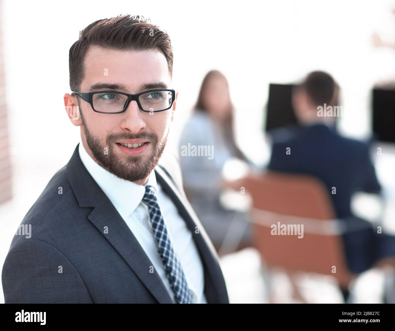 modern businessman standing in office.business background Stock Photo ...