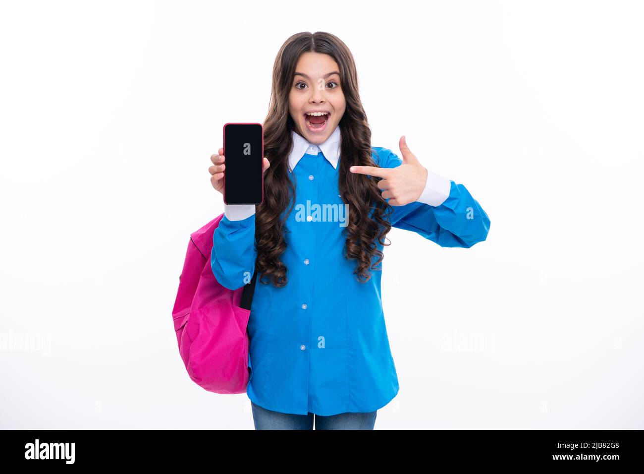 Schoolgirl student with school bag using smart phone. School uniform ...