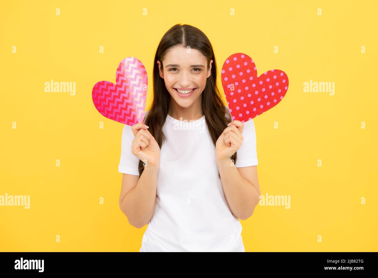 Beautiful amazing woman cuddle paper card heart shape, dreamy isolated ...