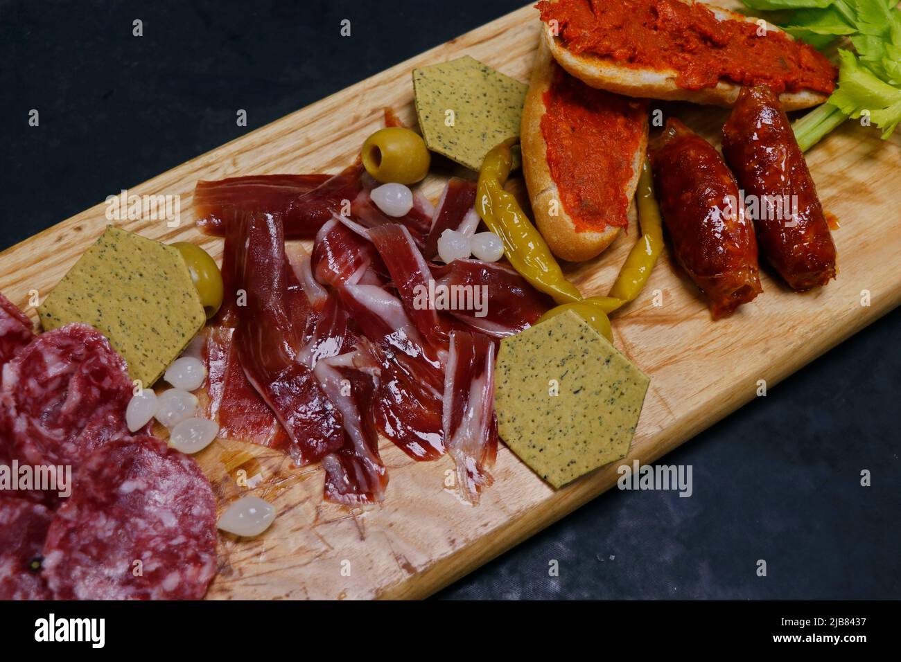 spanish cold cuts with pork chorizo and cured ham Stock Photo - Alamy
