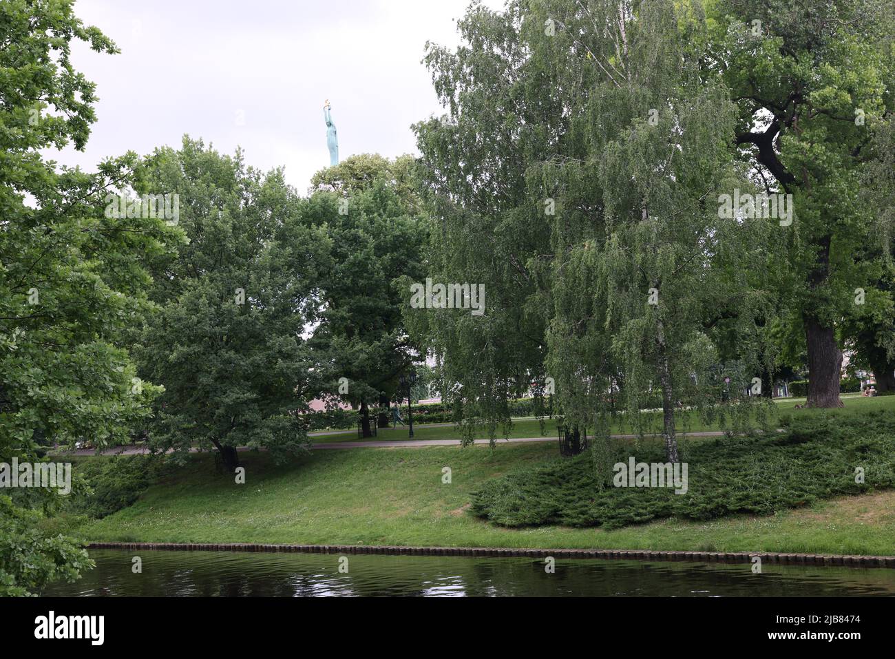 Riga Latvia city center park with canal and rare species Trees and ...
