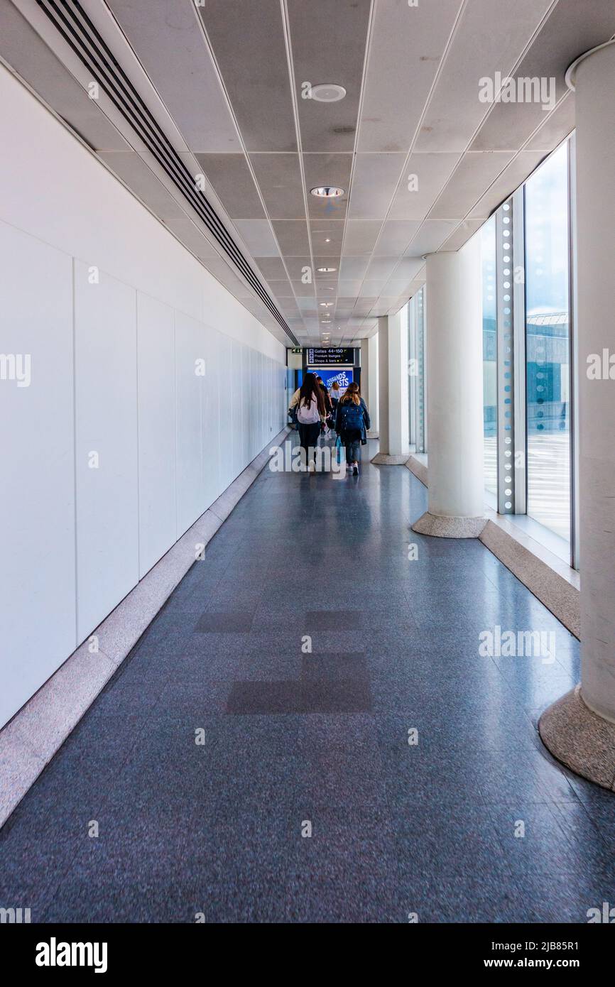 interior walkway to check in for flights at Manchester Airport terminal ...