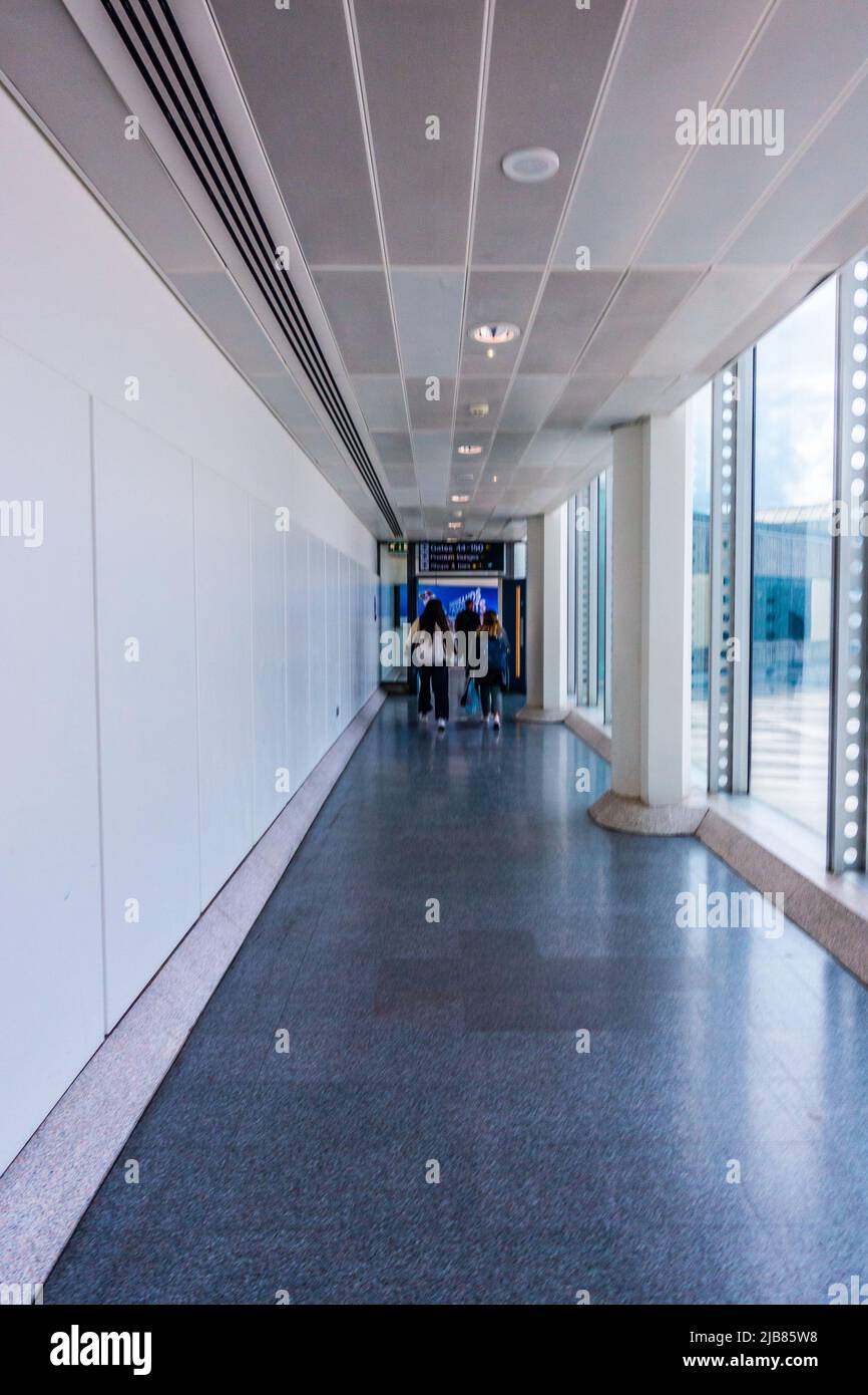 interior walkway to check in for flights at Manchester Airport terminal ...