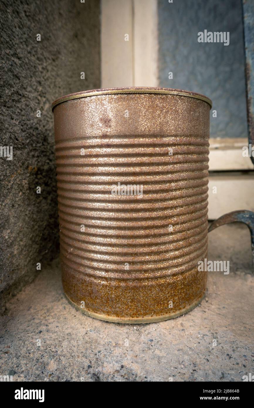 usty old can with p;d patina on a shelf Stock Photo - Alamy