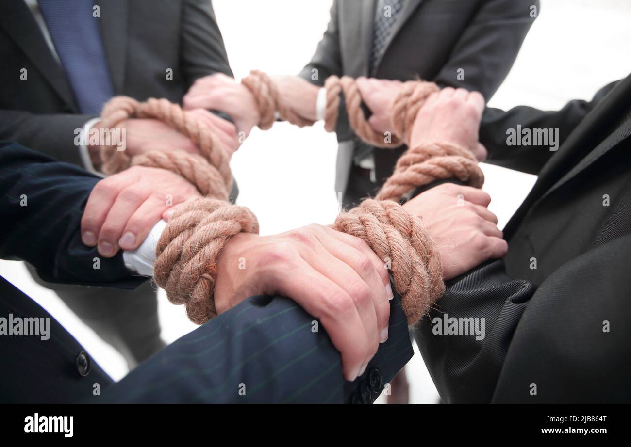 closeup.Hands holding rope forming a circle Stock Photo - Alamy