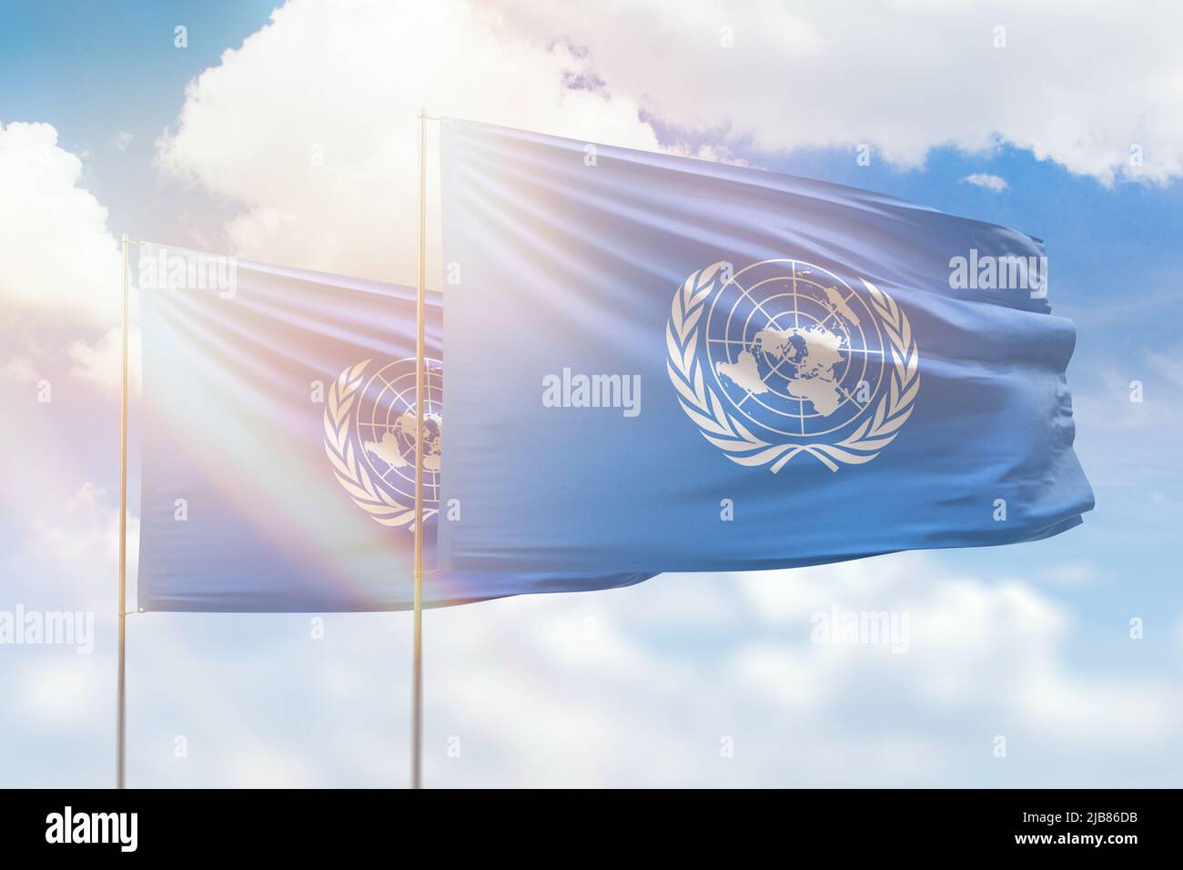 Sunny blue sky and flags of united nations and united nations Stock ...