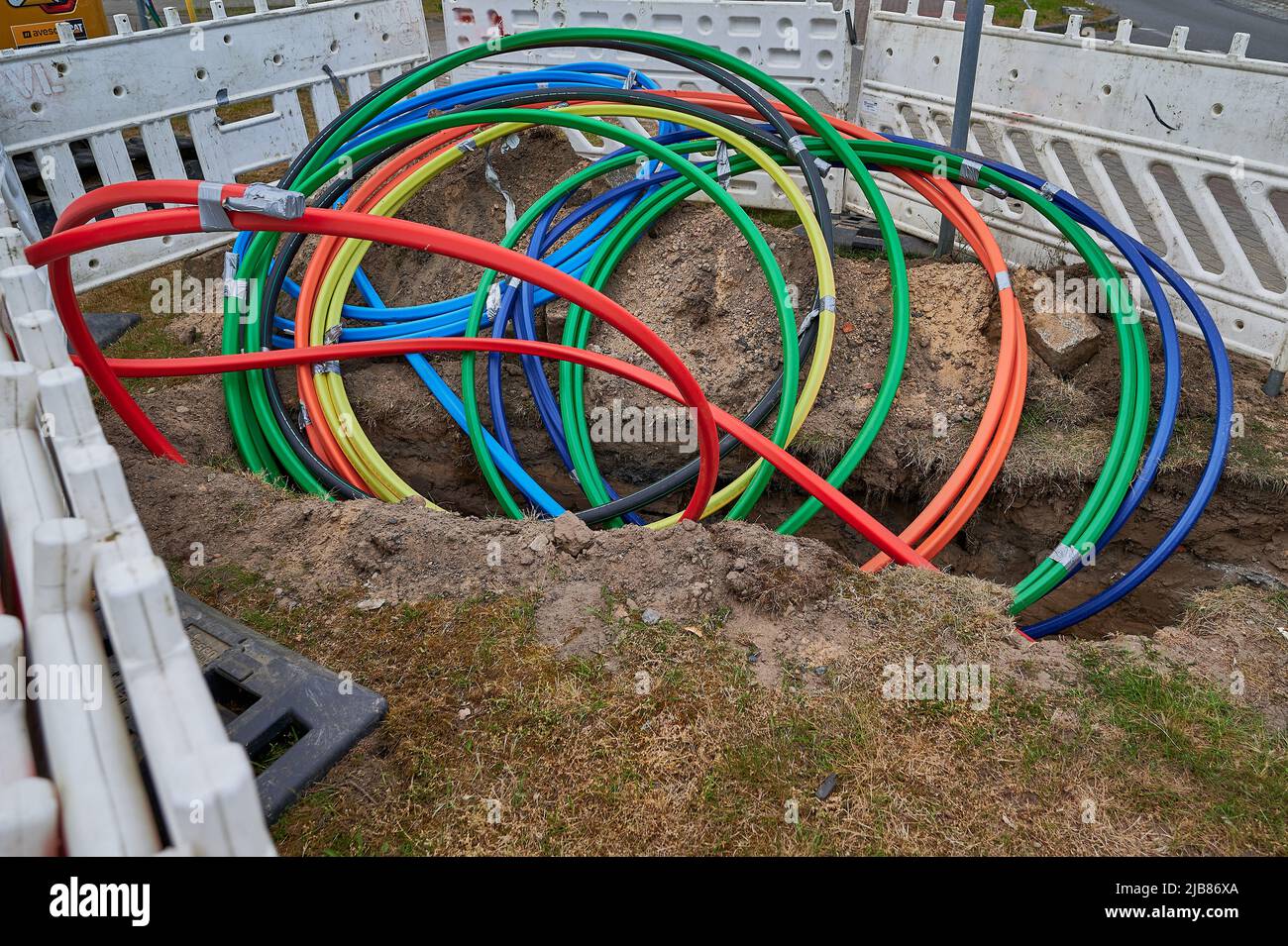 fiber laying for high speed internet construction site Stock Photo - Alamy