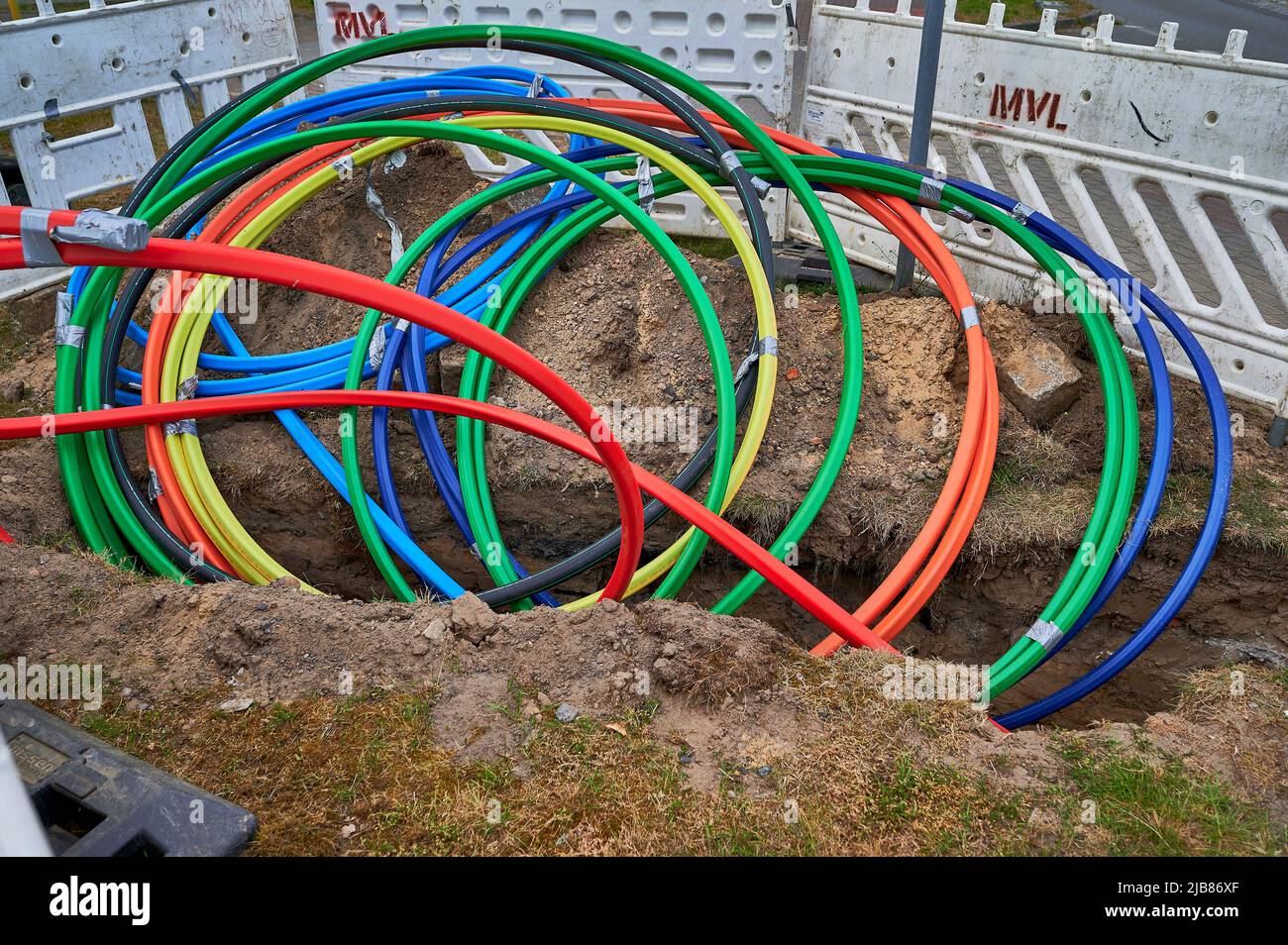fiber laying for high speed internet construction site Stock Photo - Alamy