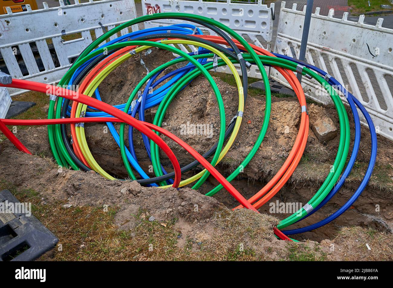 fiber laying for high speed internet construction site Stock Photo - Alamy
