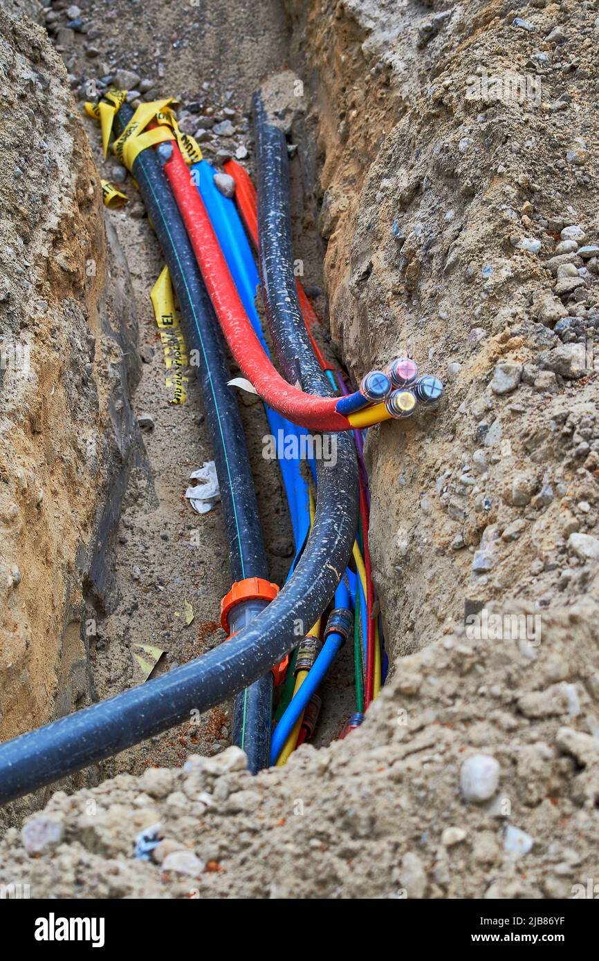 fiber laying for high speed internet construction site Stock Photo - Alamy