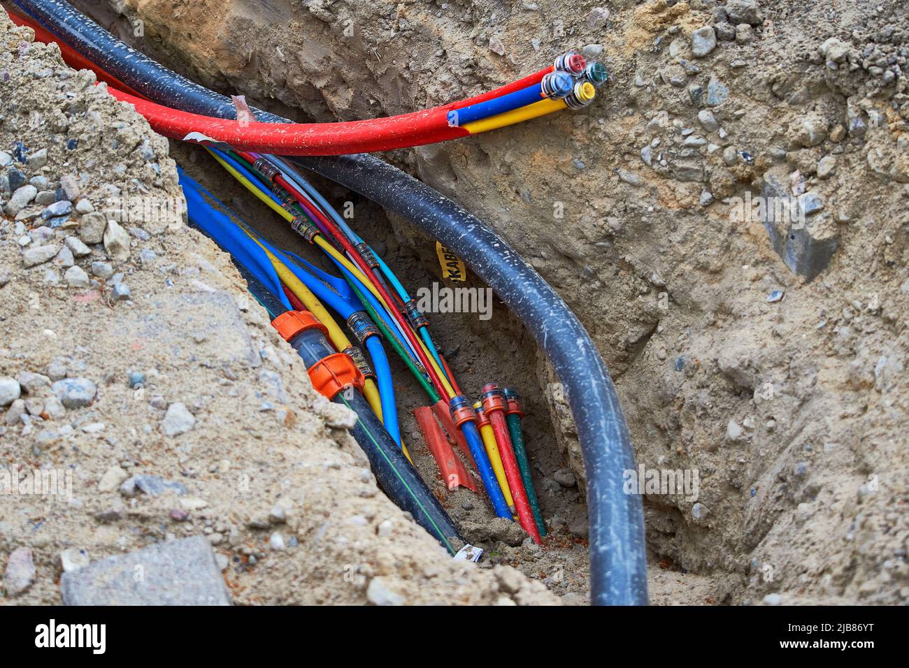 fiber laying for high speed internet construction site Stock Photo - Alamy