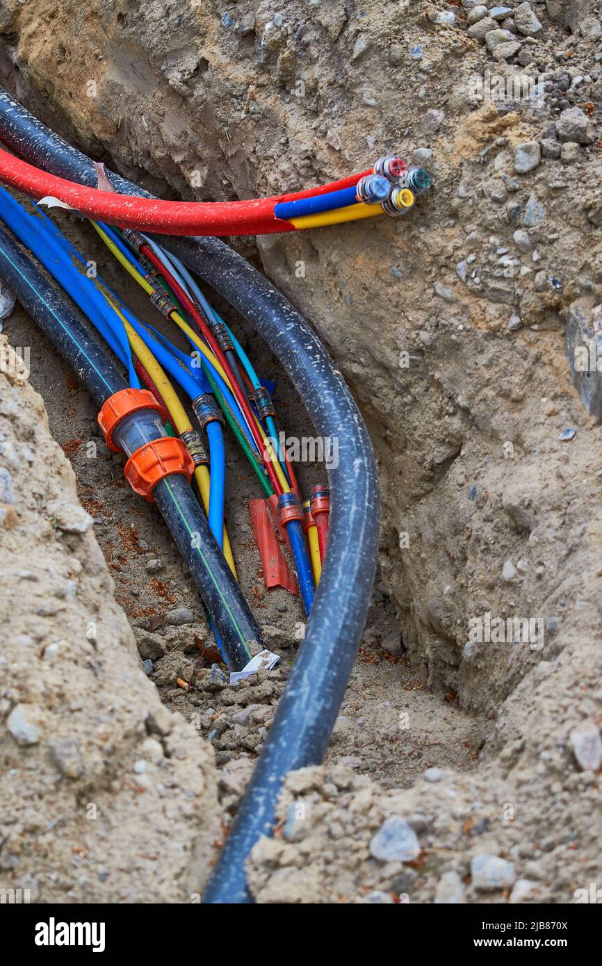 fiber laying for high speed internet construction site Stock Photo - Alamy
