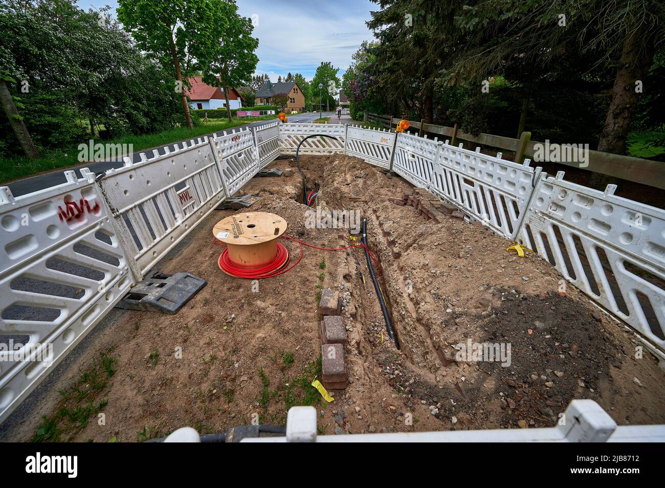 fiber laying for high speed internet construction site Stock Photo - Alamy