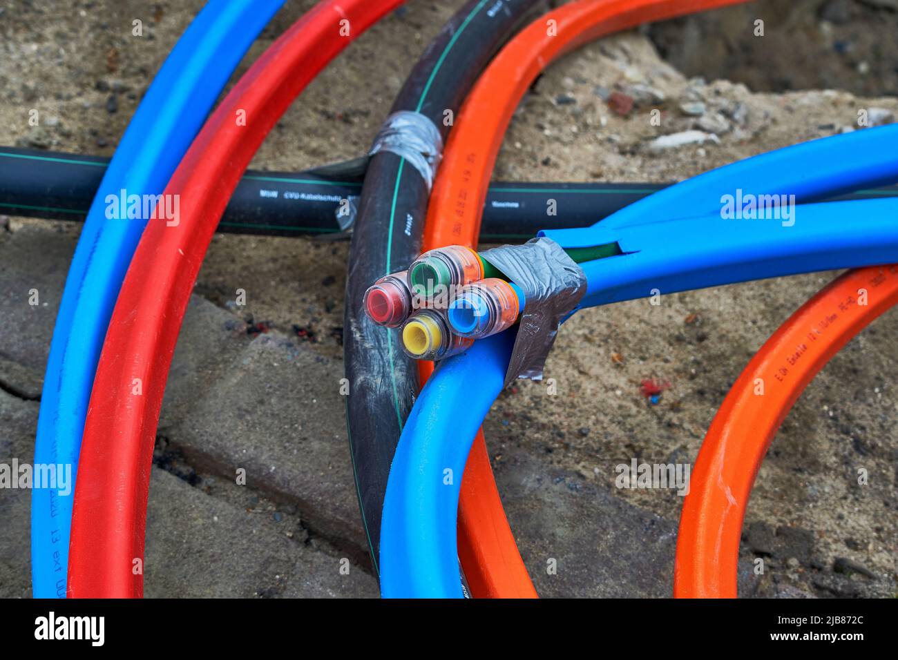 fiber laying for high speed internet construction site Stock Photo - Alamy