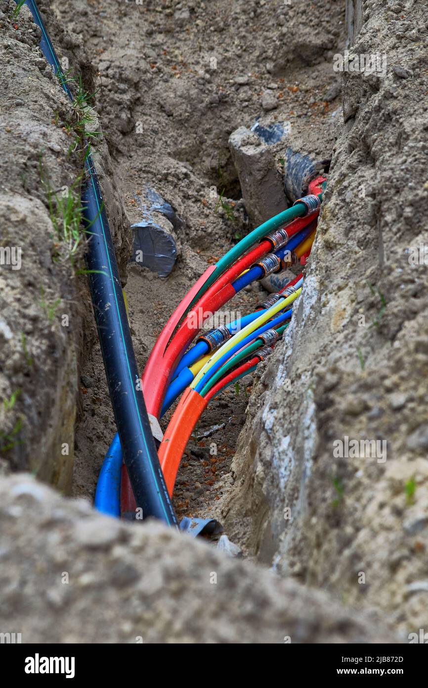 fiber laying for high speed internet construction site Stock Photo - Alamy