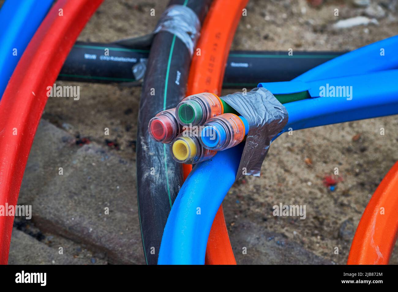 fiber laying for high speed internet construction site Stock Photo - Alamy