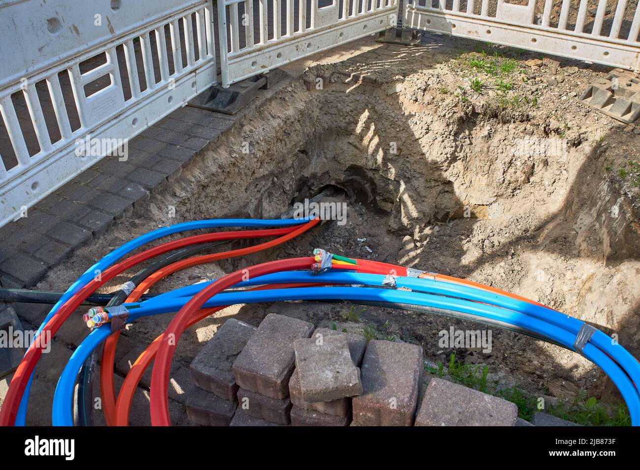 fiber laying for high speed internet construction site Stock Photo - Alamy