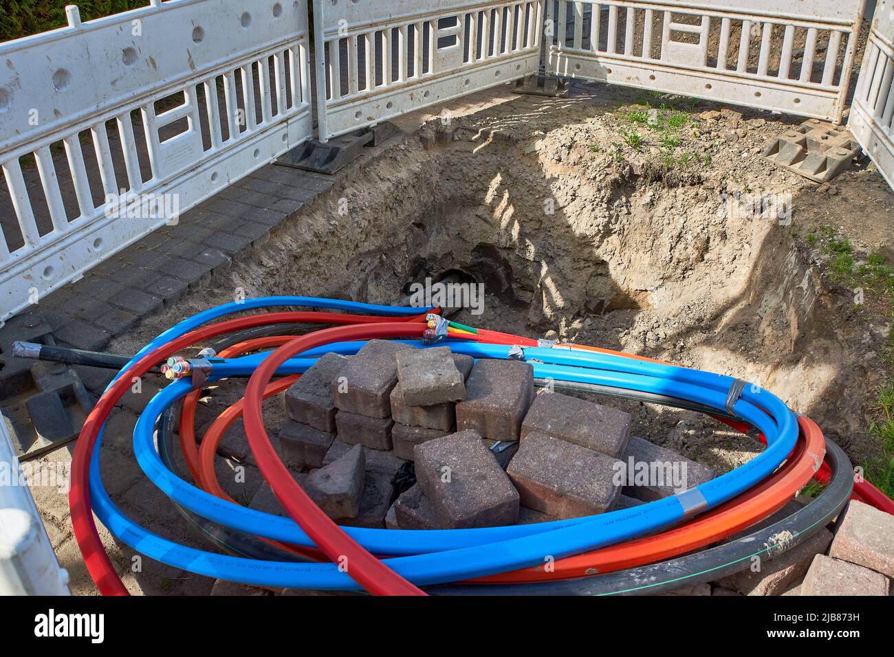 fiber laying for high speed internet construction site Stock Photo - Alamy