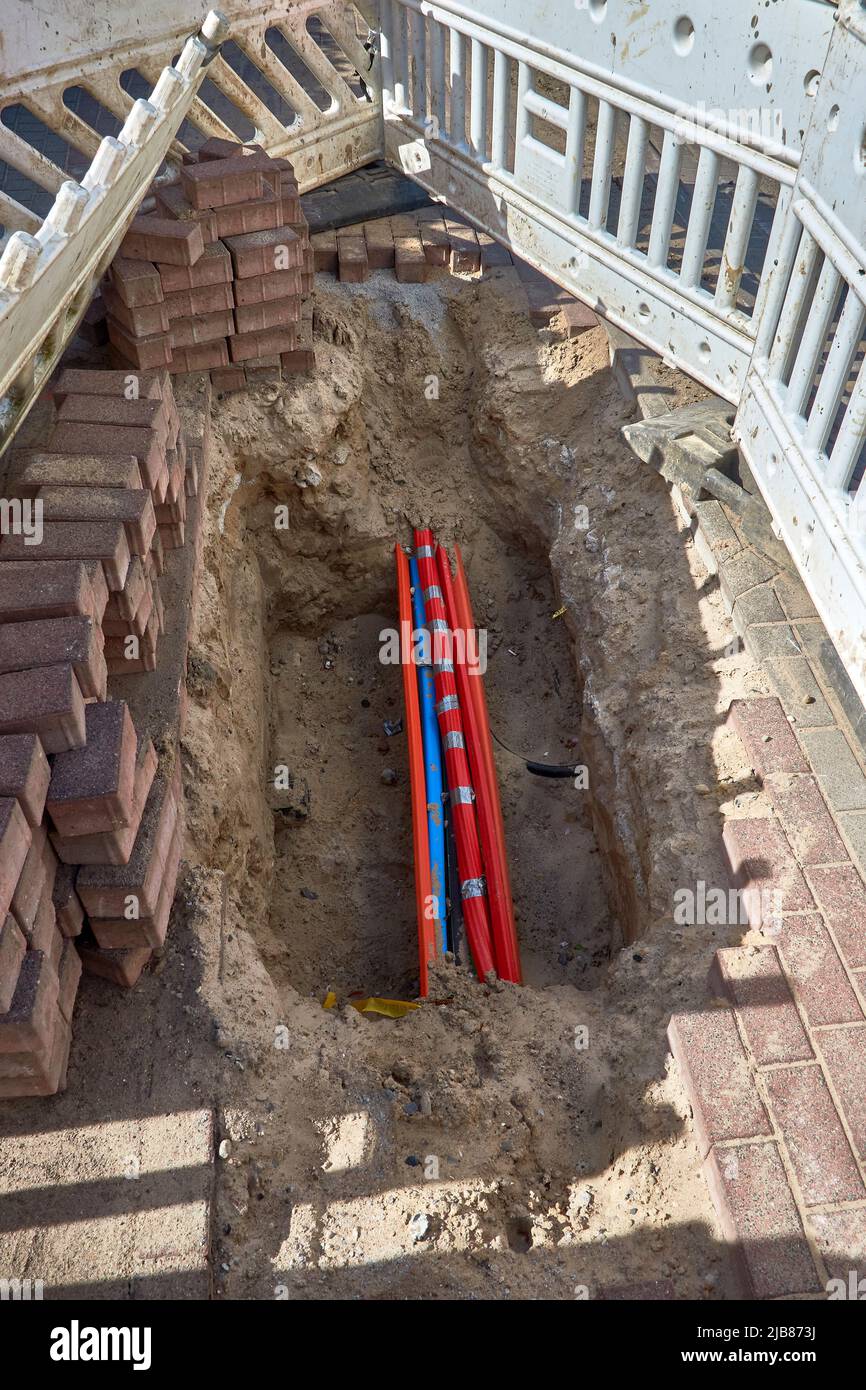 fiber laying for high speed internet construction site Stock Photo - Alamy