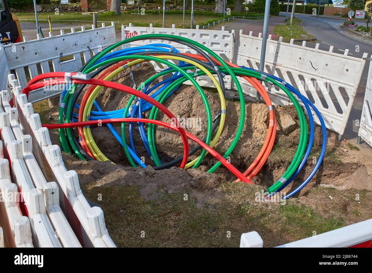 fiber laying for high speed internet construction site Stock Photo - Alamy