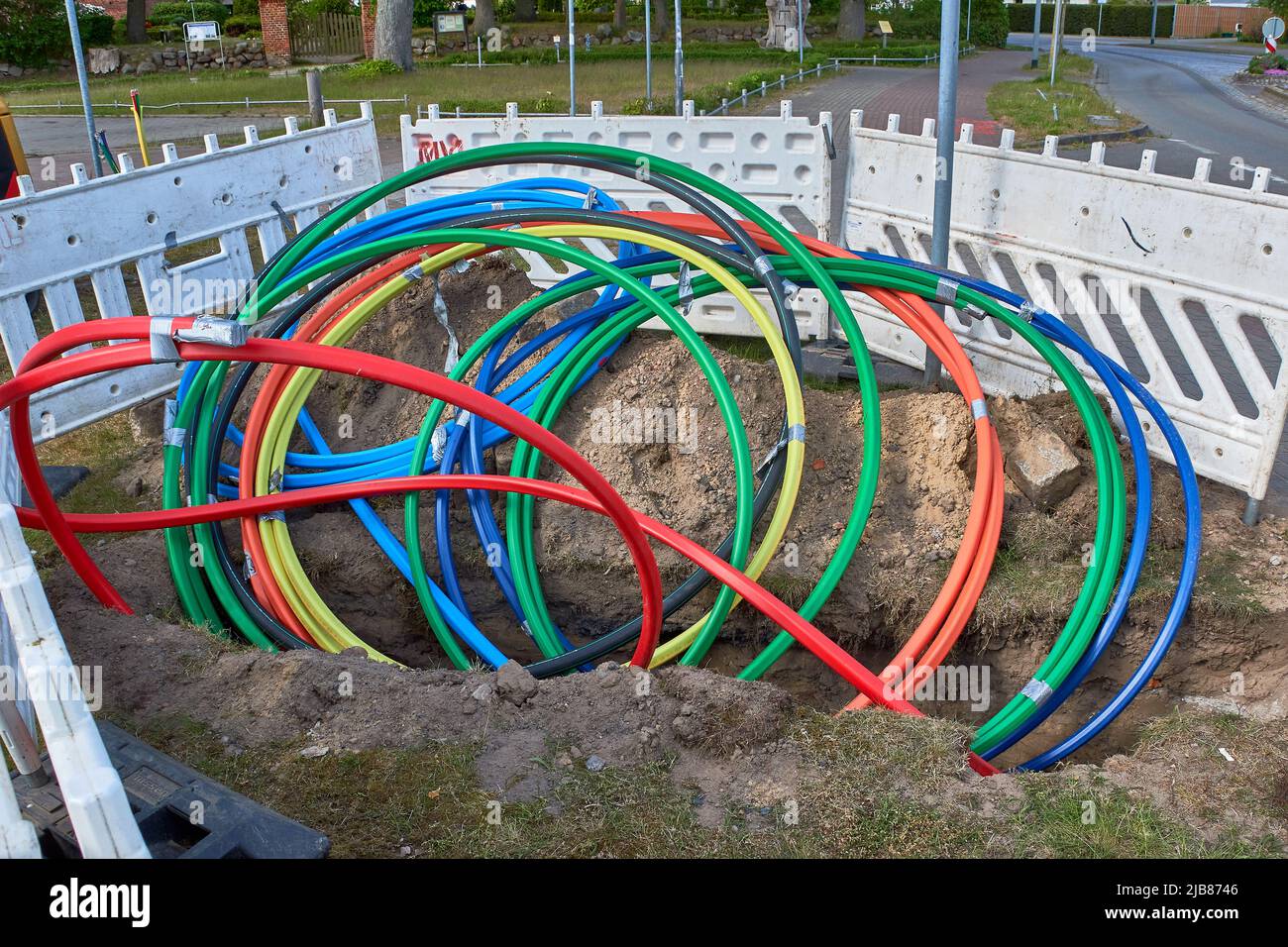 fiber laying for high speed internet construction site Stock Photo - Alamy
