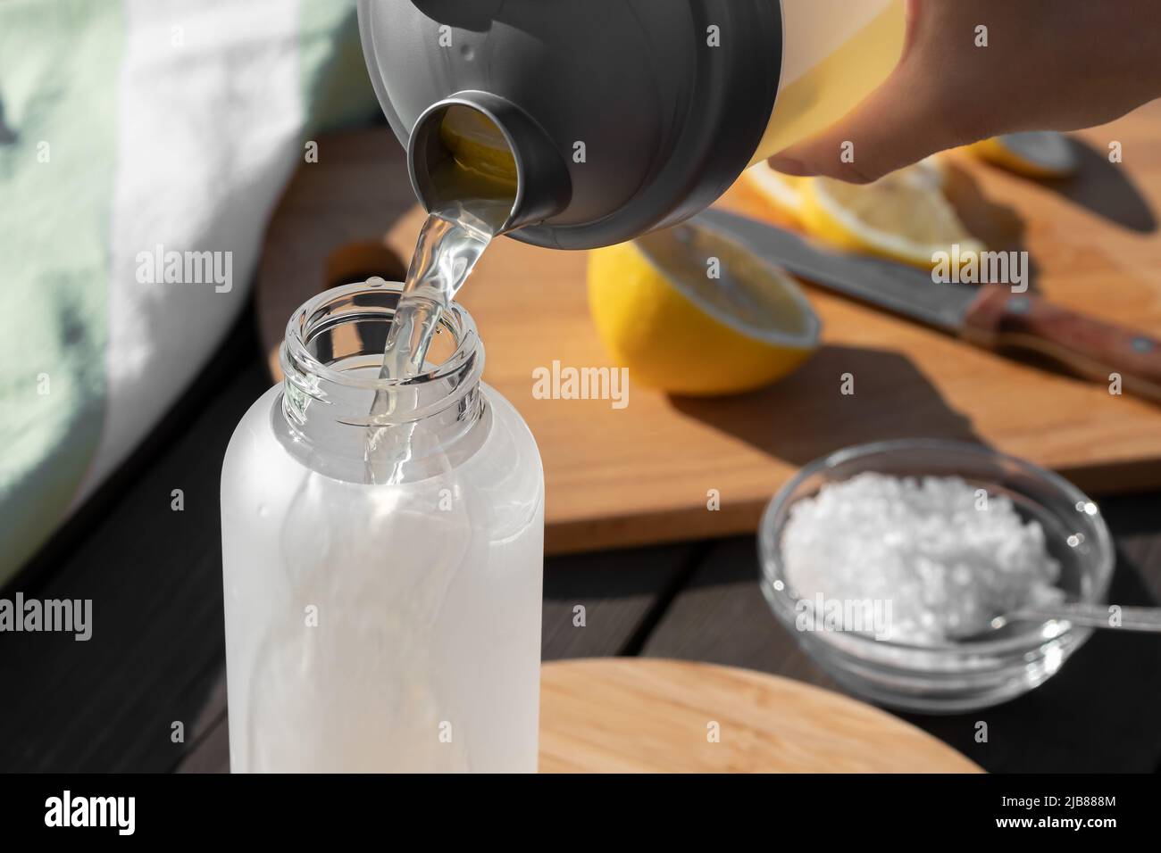 Cooking fresh homemade isotonic from natural ingredients - salt, lemon ...