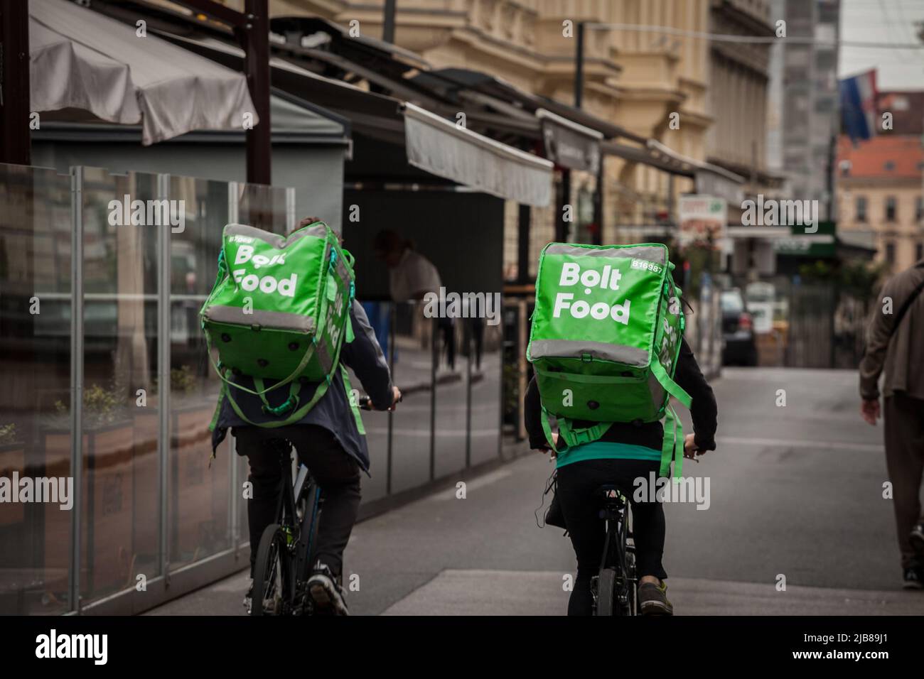 Picture of a food delivery guy from Bolt food walking in the streets of ...