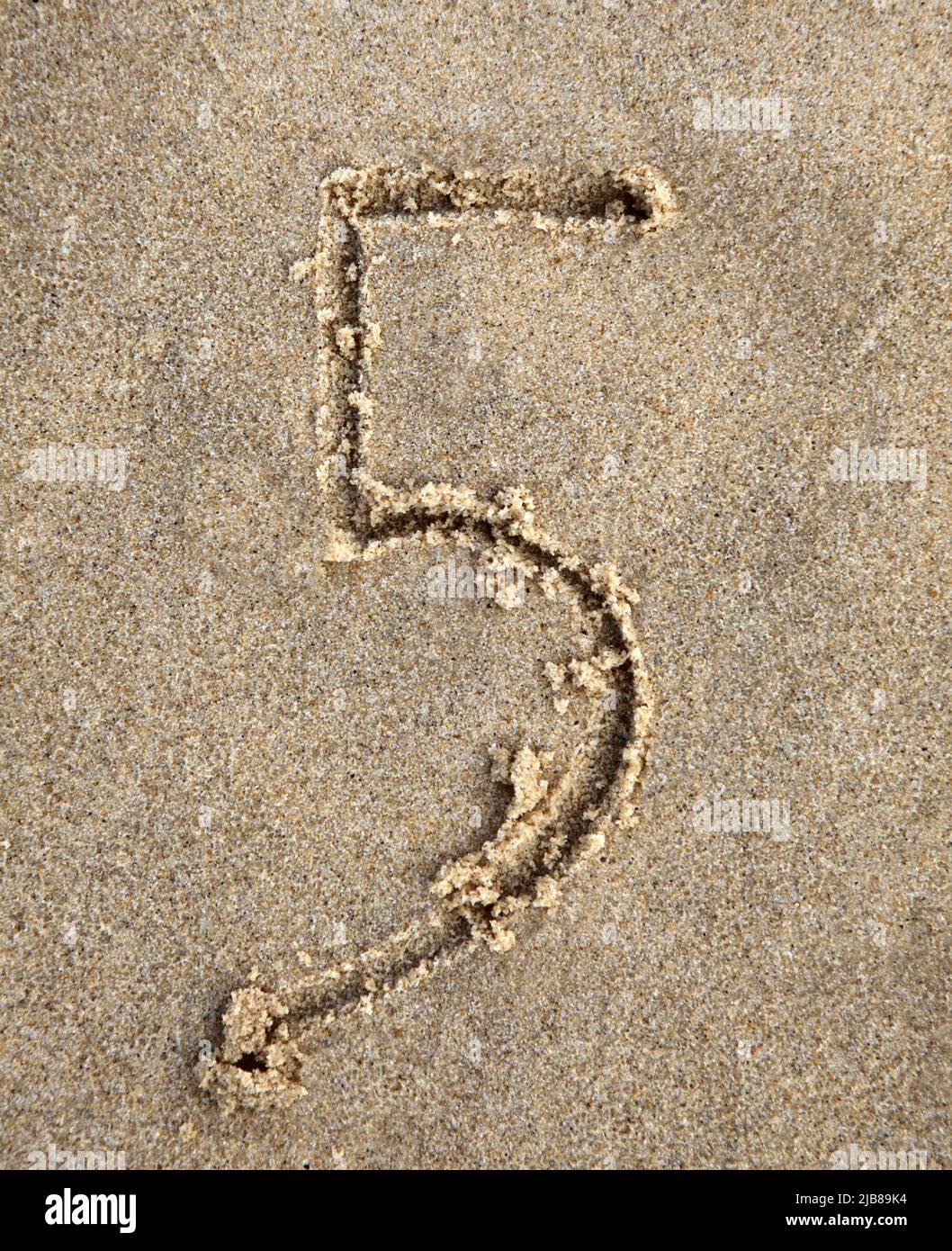 five written in the sand at the beach Stock Photo - Alamy
