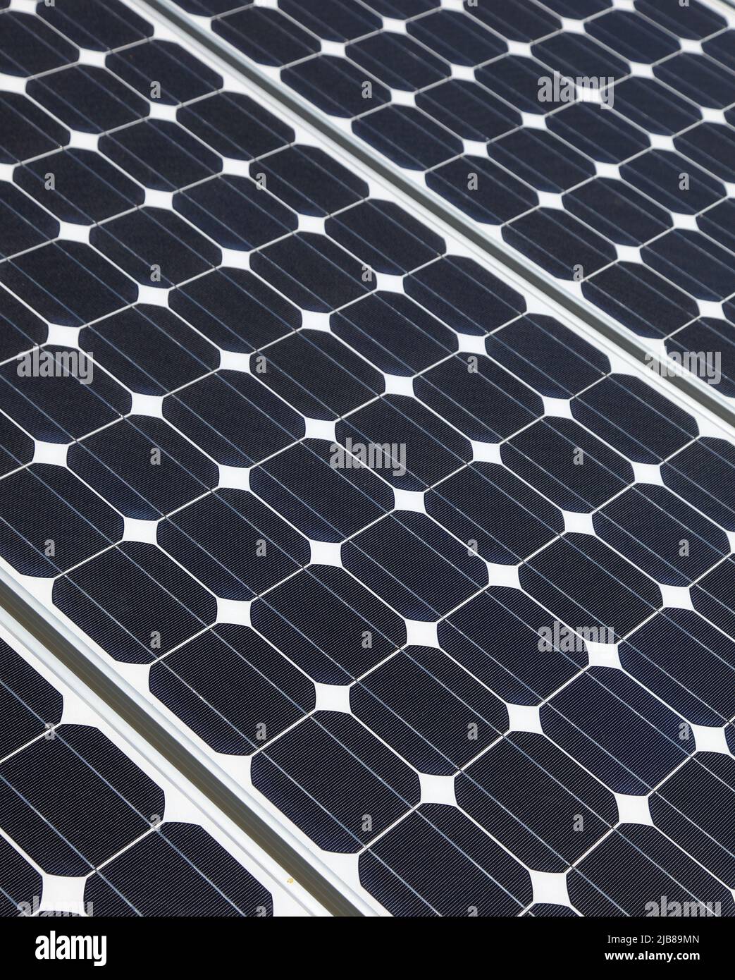 Closeup of solar panel cells mounted on roof top. Solar energy is ...