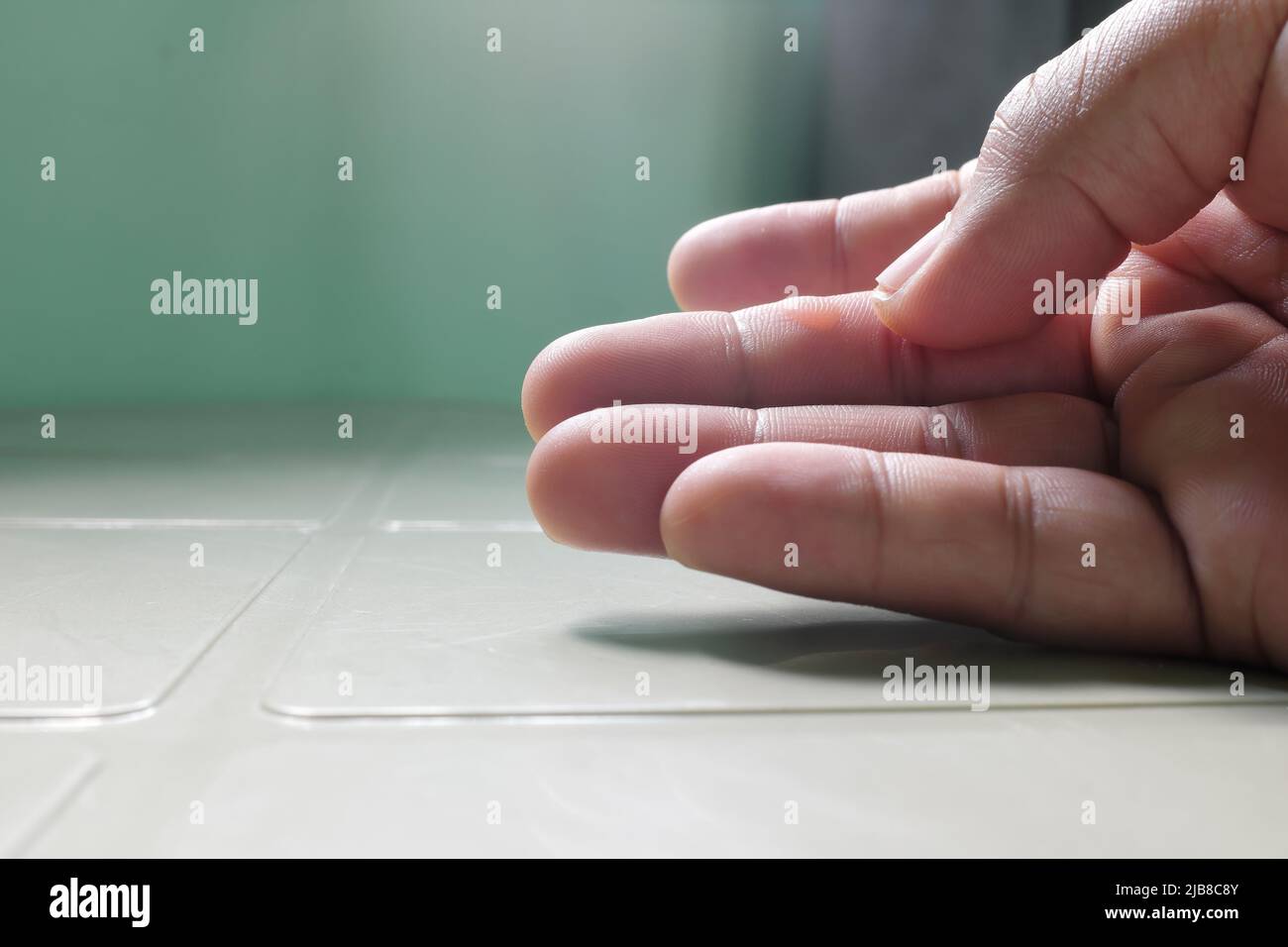 Selective focus of human male hand with blisters caused by heavy work ...