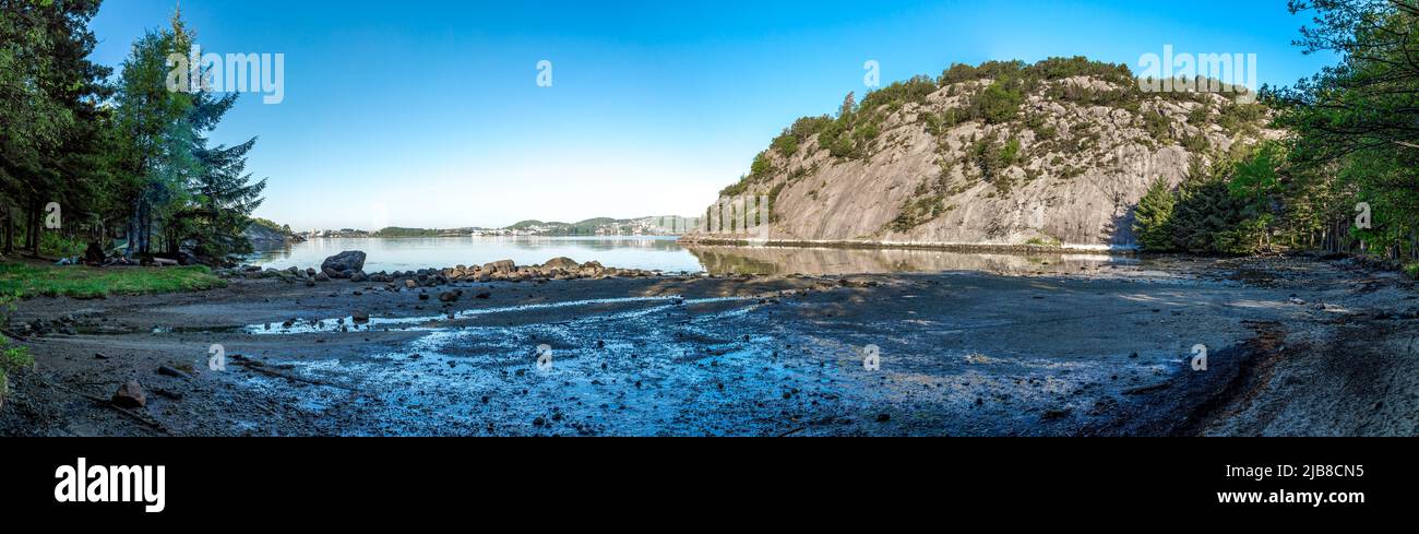 Panorama of a small rocky beach of Gandsfjord fjord near Dale with a ...