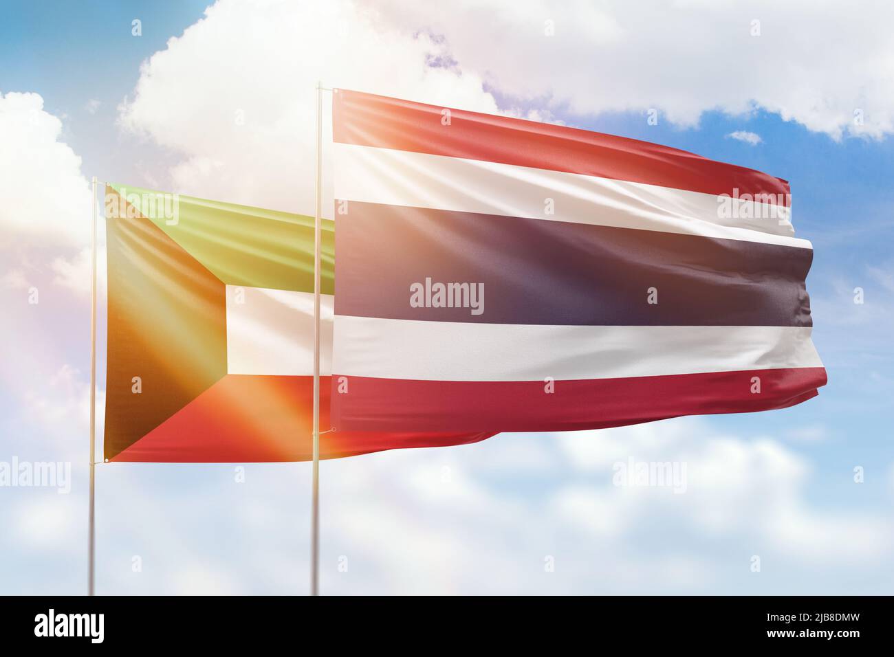 Sunny blue sky and flags of thailand and kuwait Stock Photo - Alamy