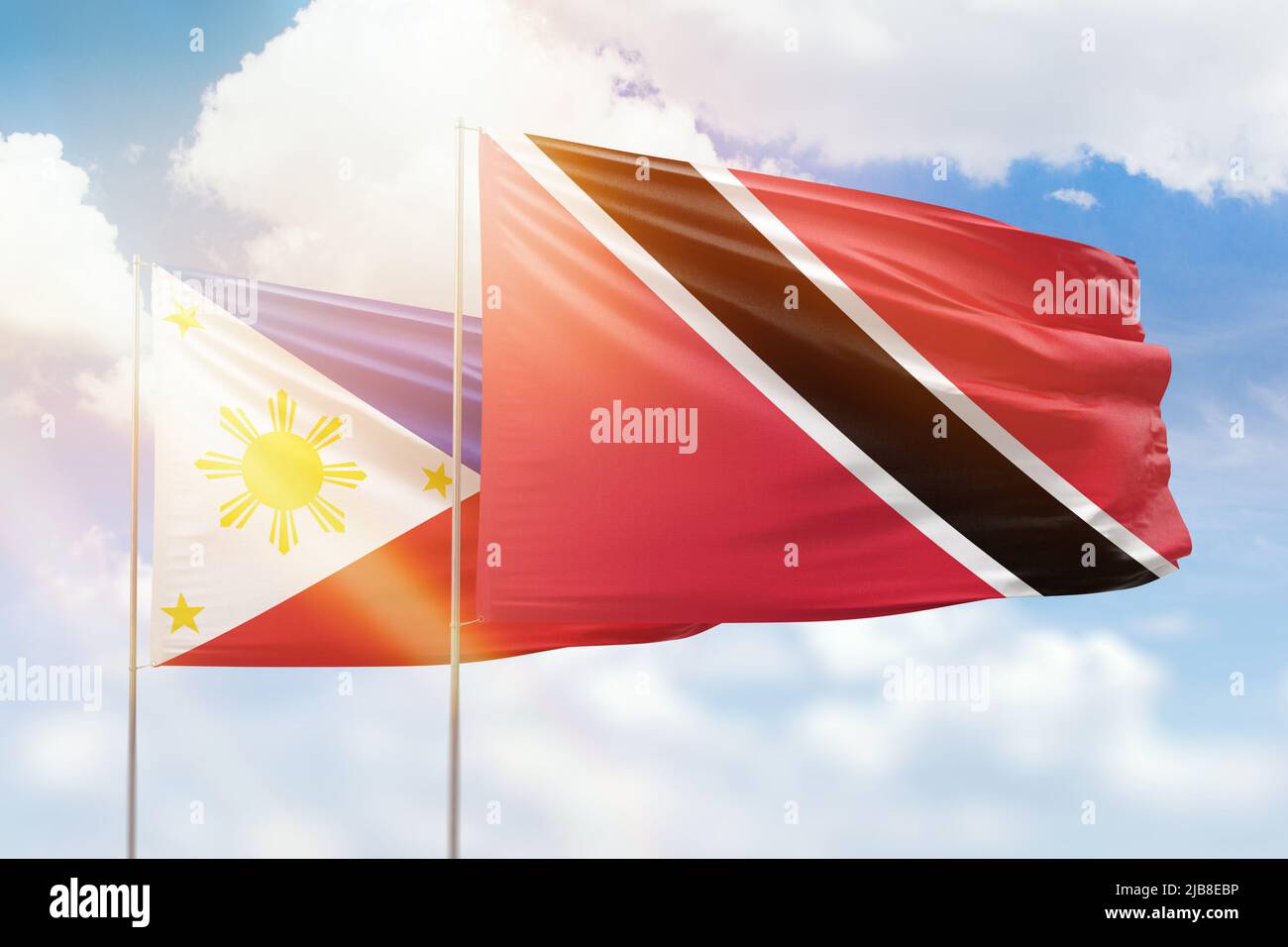 Sunny blue sky and flags of trinidad and tobago and philippines Stock ...