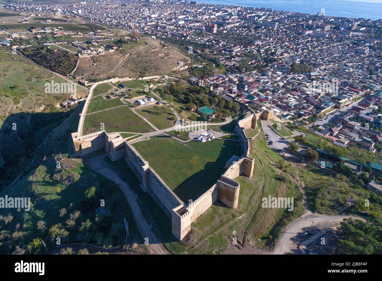 View from a height of the ancient Naryn-Kala fortress and the city of ...