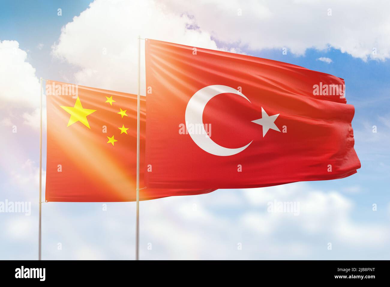 Sunny blue sky and flags of turkey and china Stock Photo - Alamy