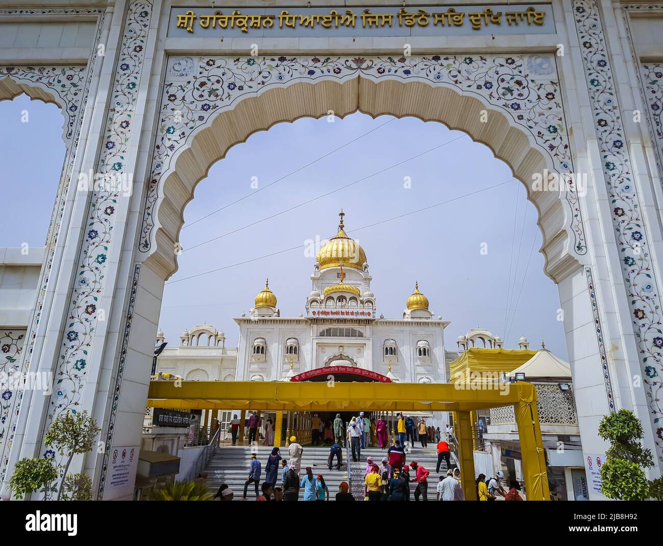 isolated gurudwara building entrance gate with flat sky at morning from ...