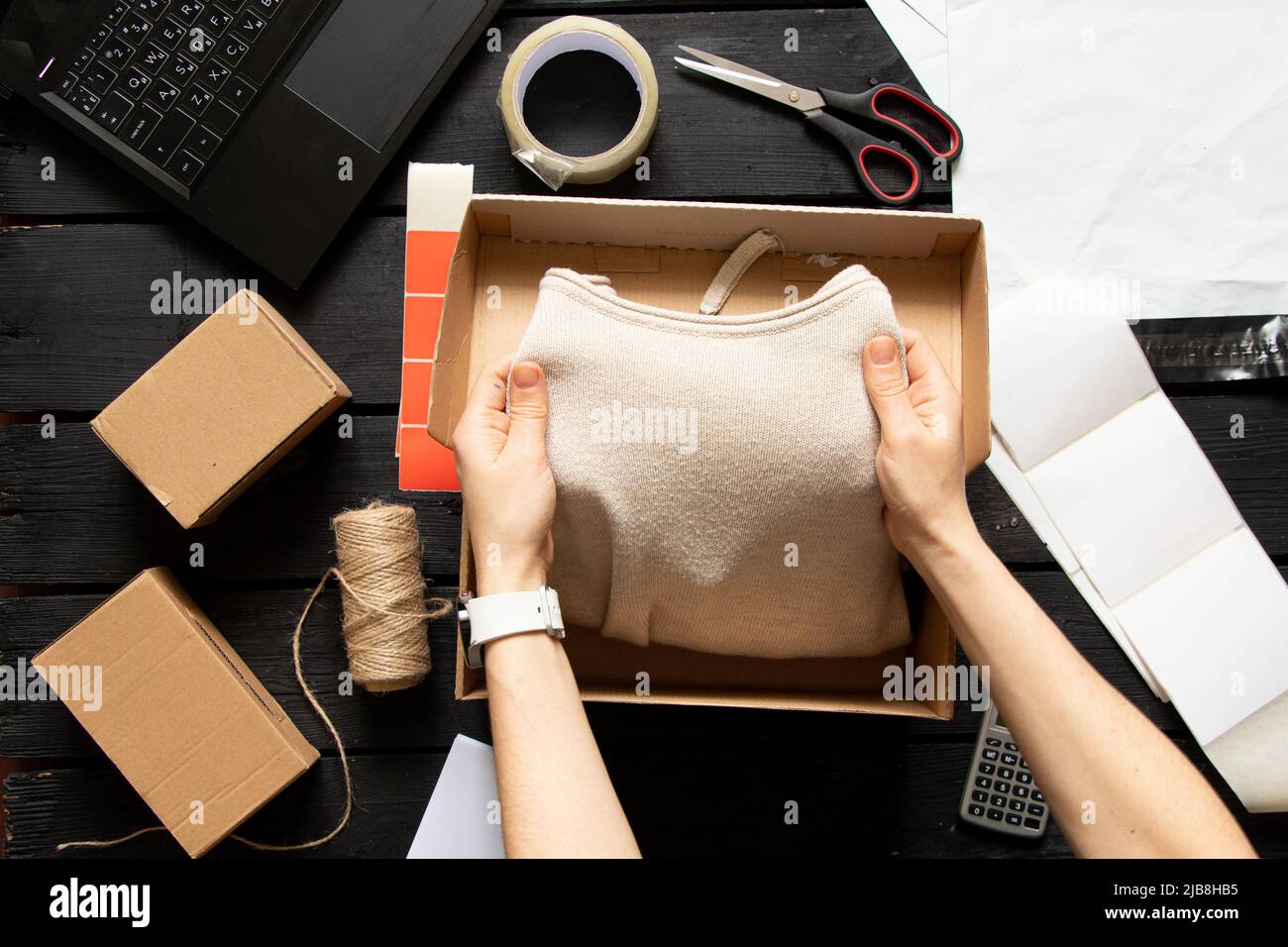 Packaging clothes hi-res stock photography and images - Alamy