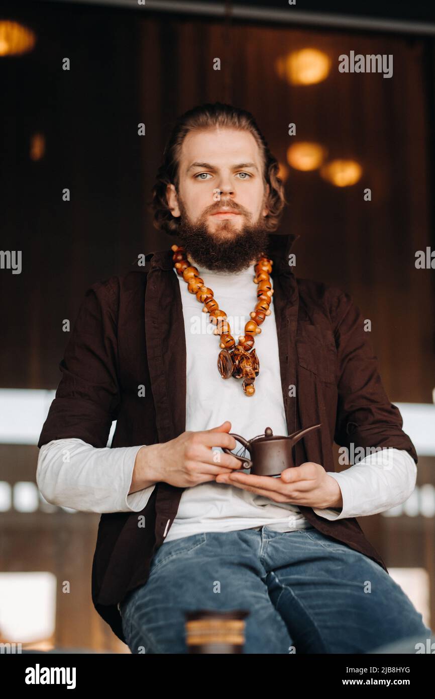 Master man holding tea ceremony hi-res stock photography and images - Alamy