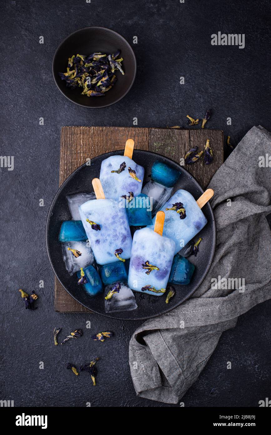Blue ice cream popsicle from Butterfly pea Stock Photo - Alamy