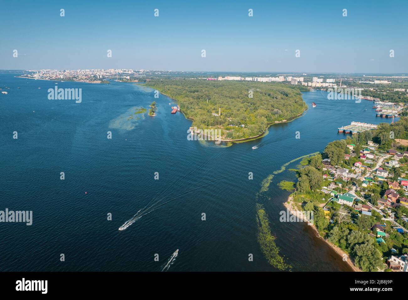 Aerial landscape view on Volga river with islands and green forest ...