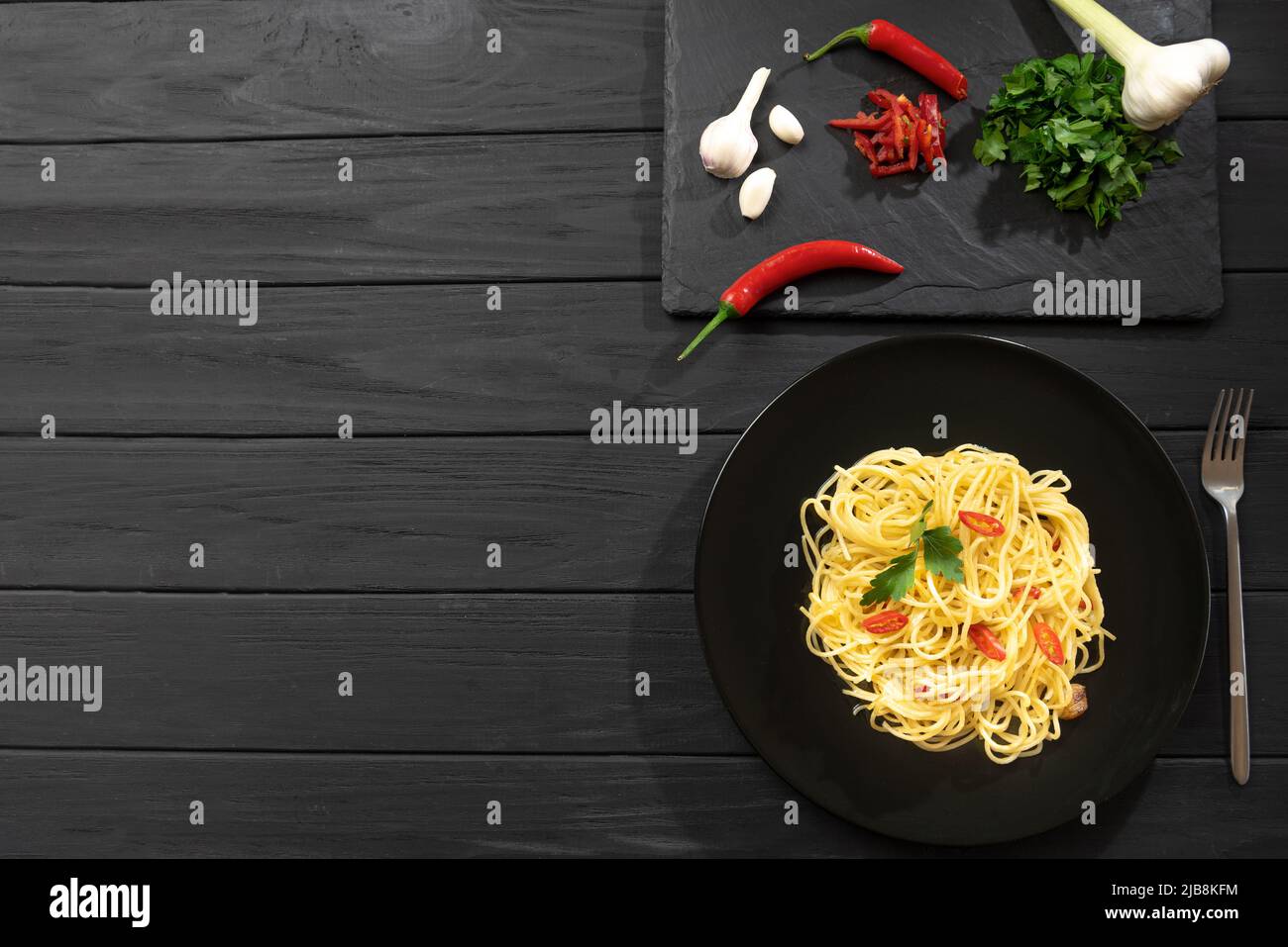 Traditional Italian spaghetti on a black background. Italian pasta with ...