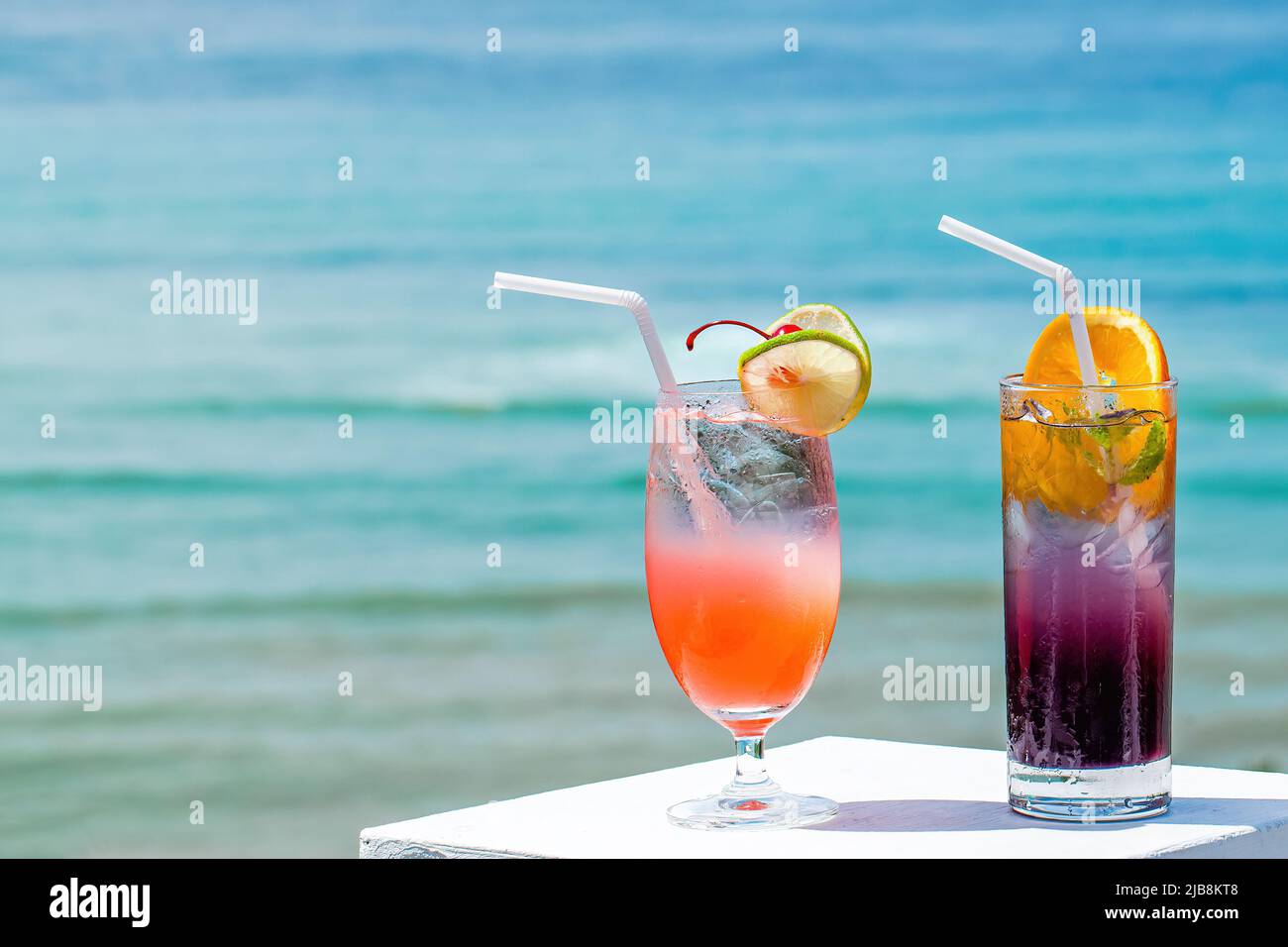 Two cocktails in luxurious hotel at sunny summer day. Mocktail drinks ...