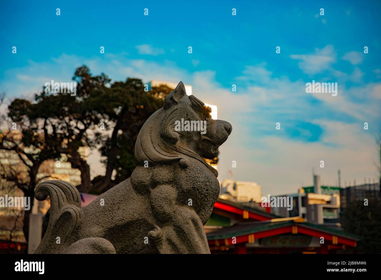 Statue guardian dog at Kanda shrine in Tokyo Stock Photo - Alamy