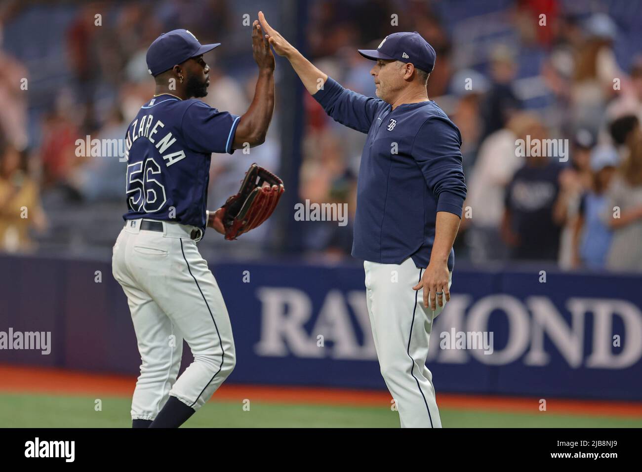St. Petersburg, FL. USA; Tampa Bay Rays manager Kevin Cash high fives ...