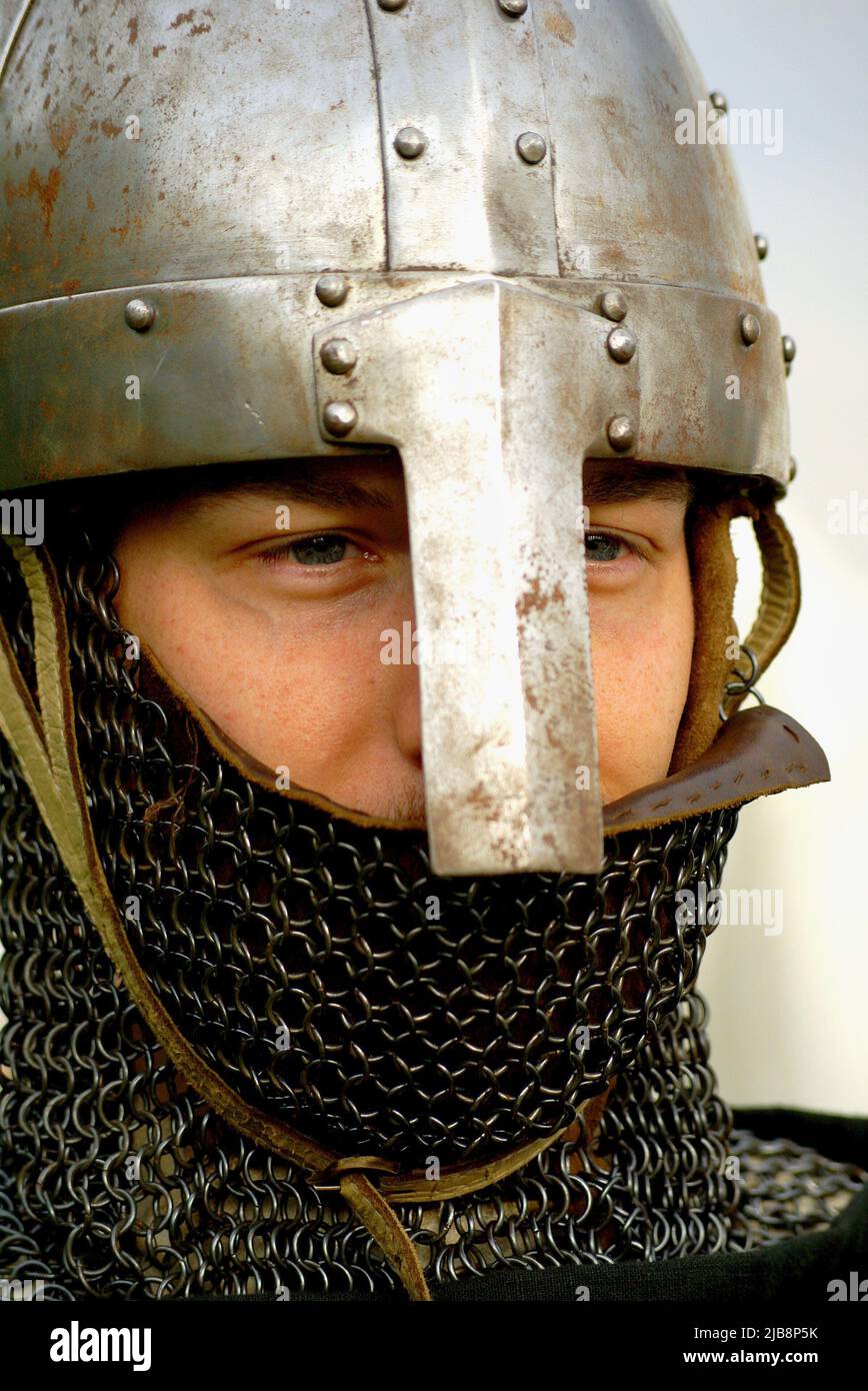 Knight face close-up with nasal helmet and chainmail on, symbol for ...