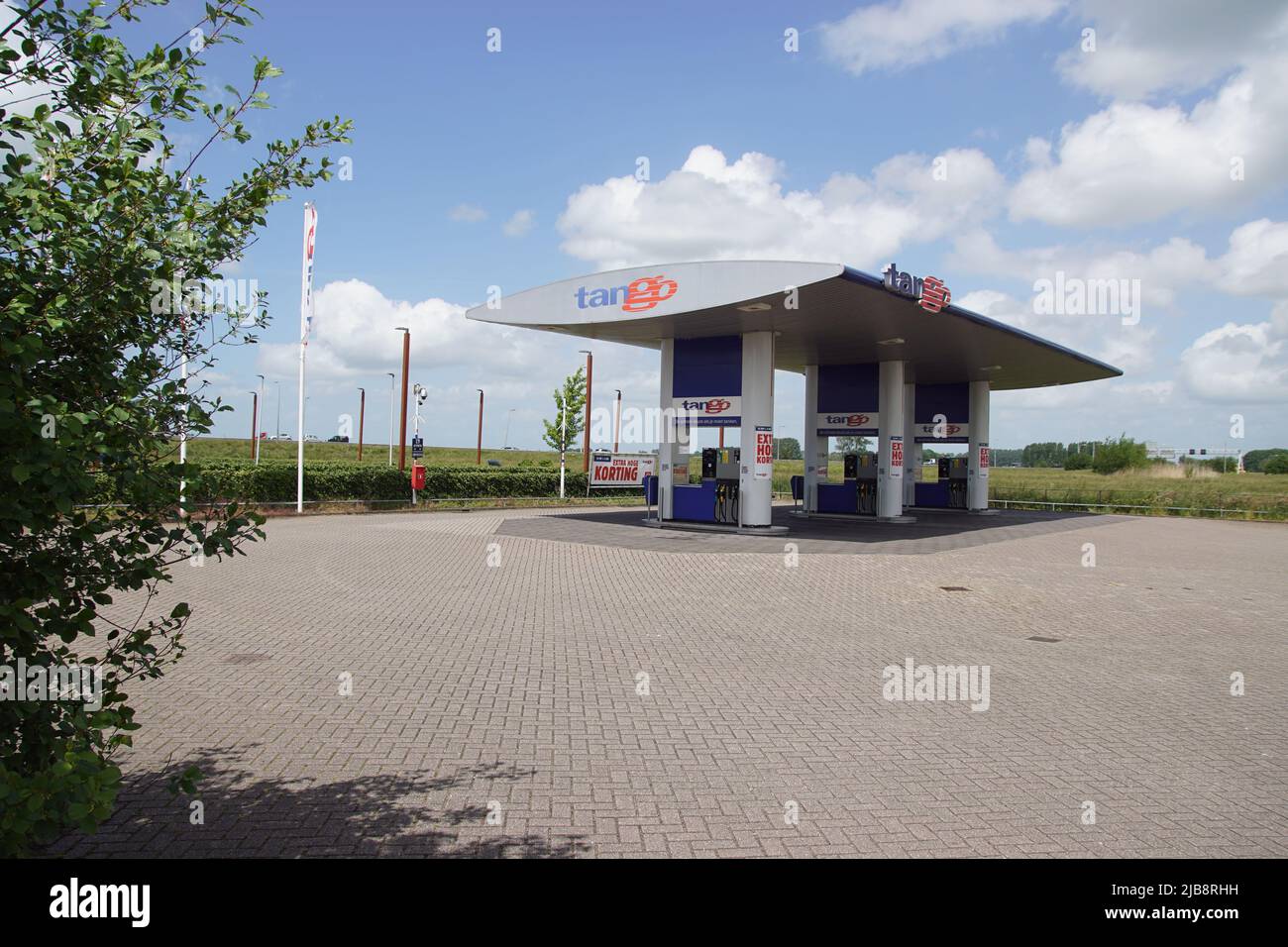 Dutch Tango unmanned gas station on the highway near Meerkerk. Spring ...