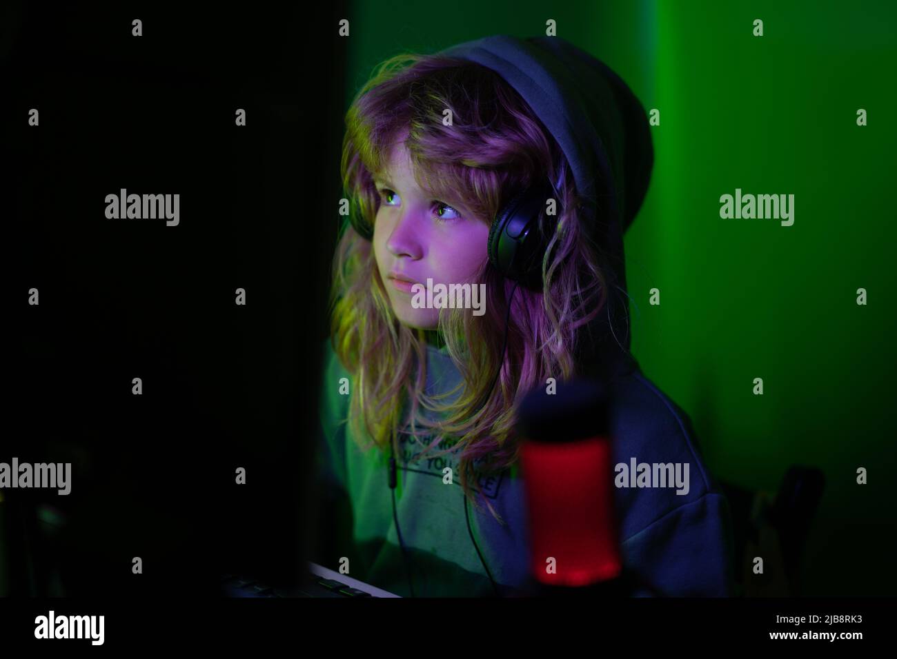 Little hacker, young programmer. Night surf in the Internet. Little ...