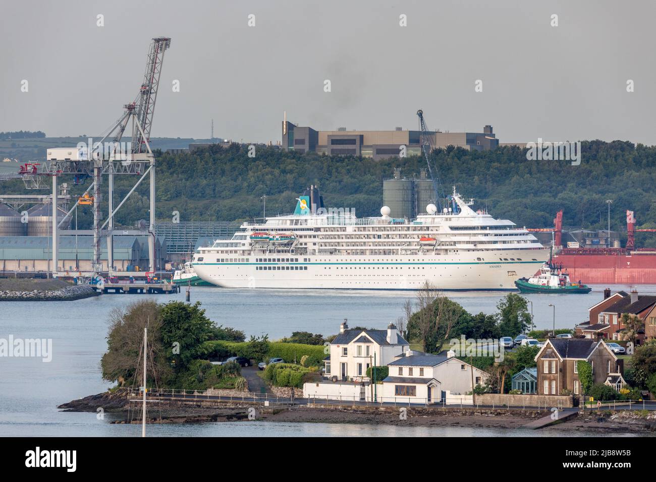 Cobh, Cork, Ireland. 04th June, 2022. Cruise liner Amadea assisted by ...